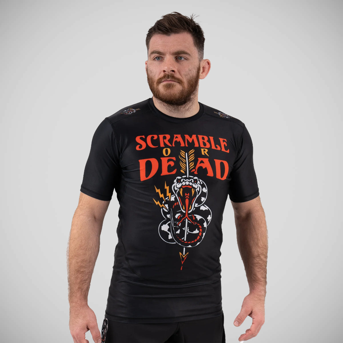 Black/Orange Scramble or Dead Rash Guard from Made4Fighters