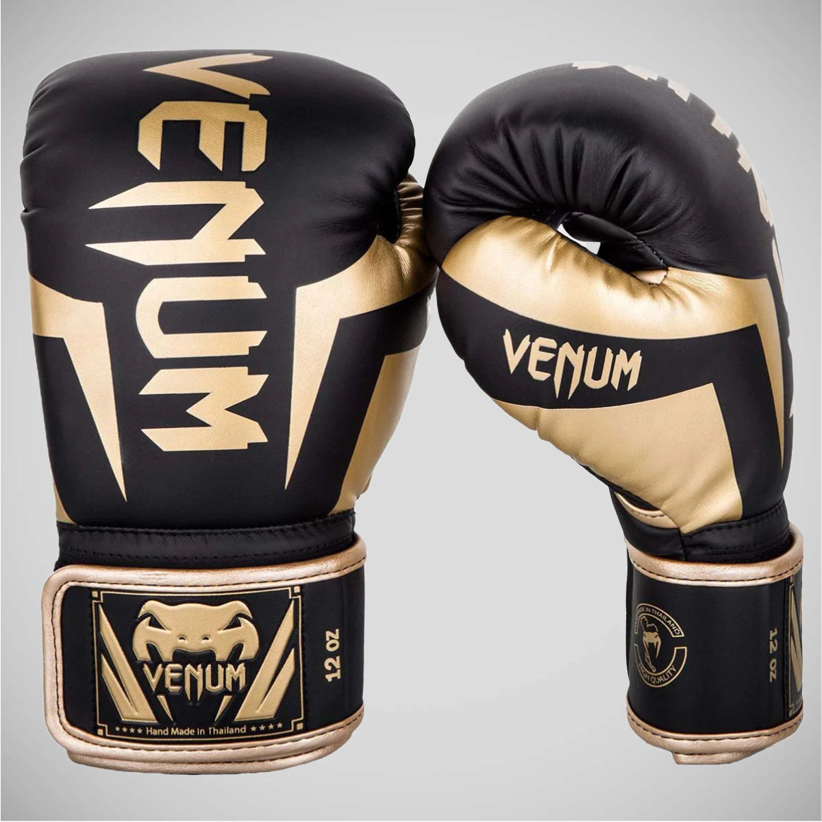 Venum Elite Boxing Gloves Black/Gold from Made4Fighters