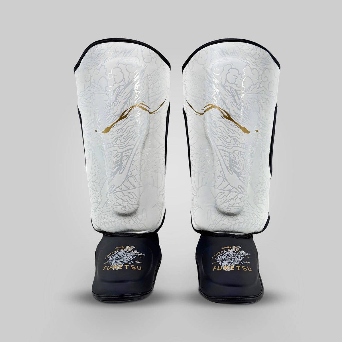 Fumetsu Dragon Slayer Shin Guards White/Black/Gold from Made4Fighters