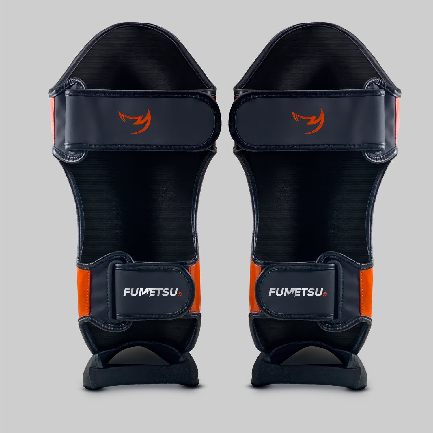 Fumetsu Icon Thai Shin Guards Black/Orange from Made4Fighters