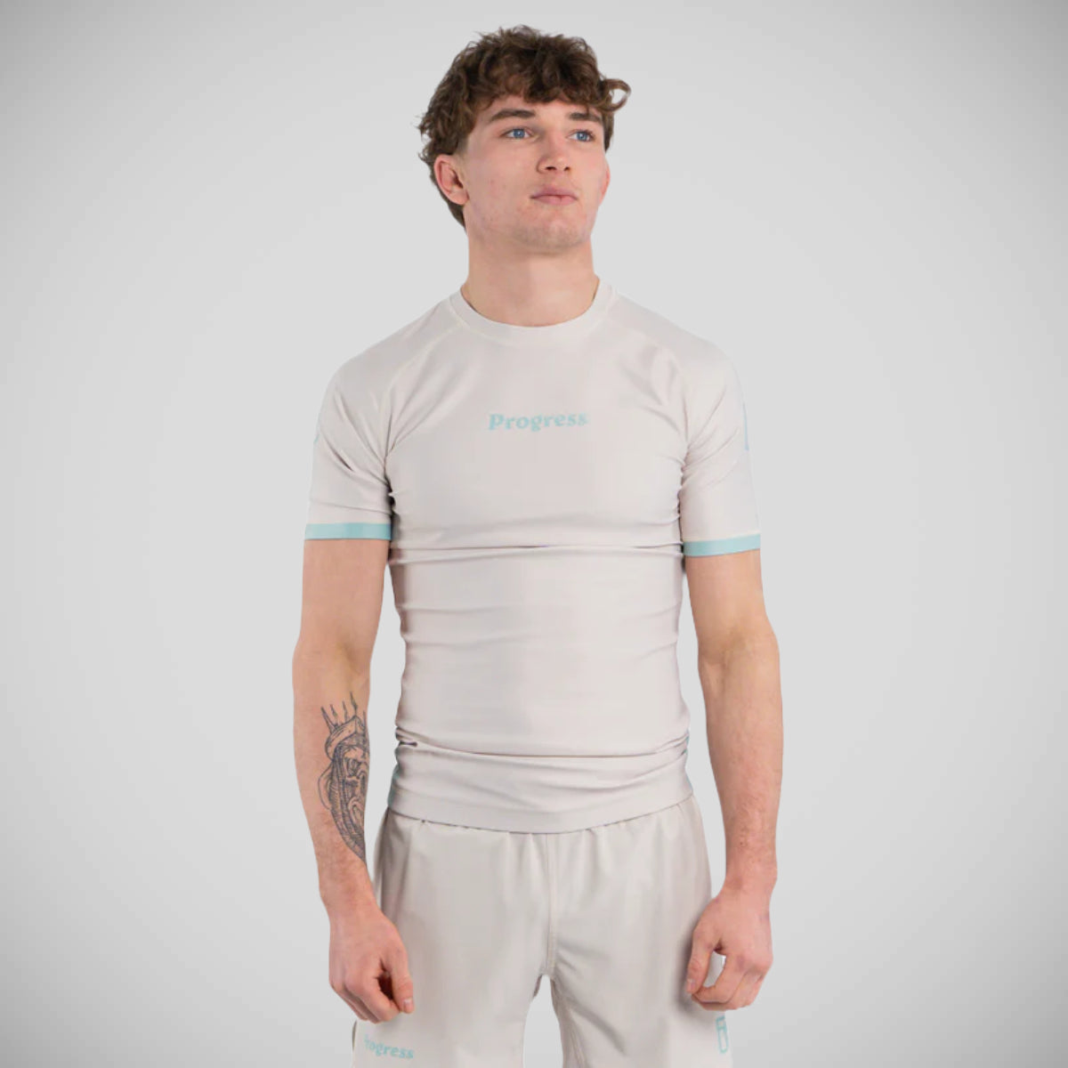 Progress Academy+ Short Sleeve Rash Guard Bone/Mint from Made4Fighters