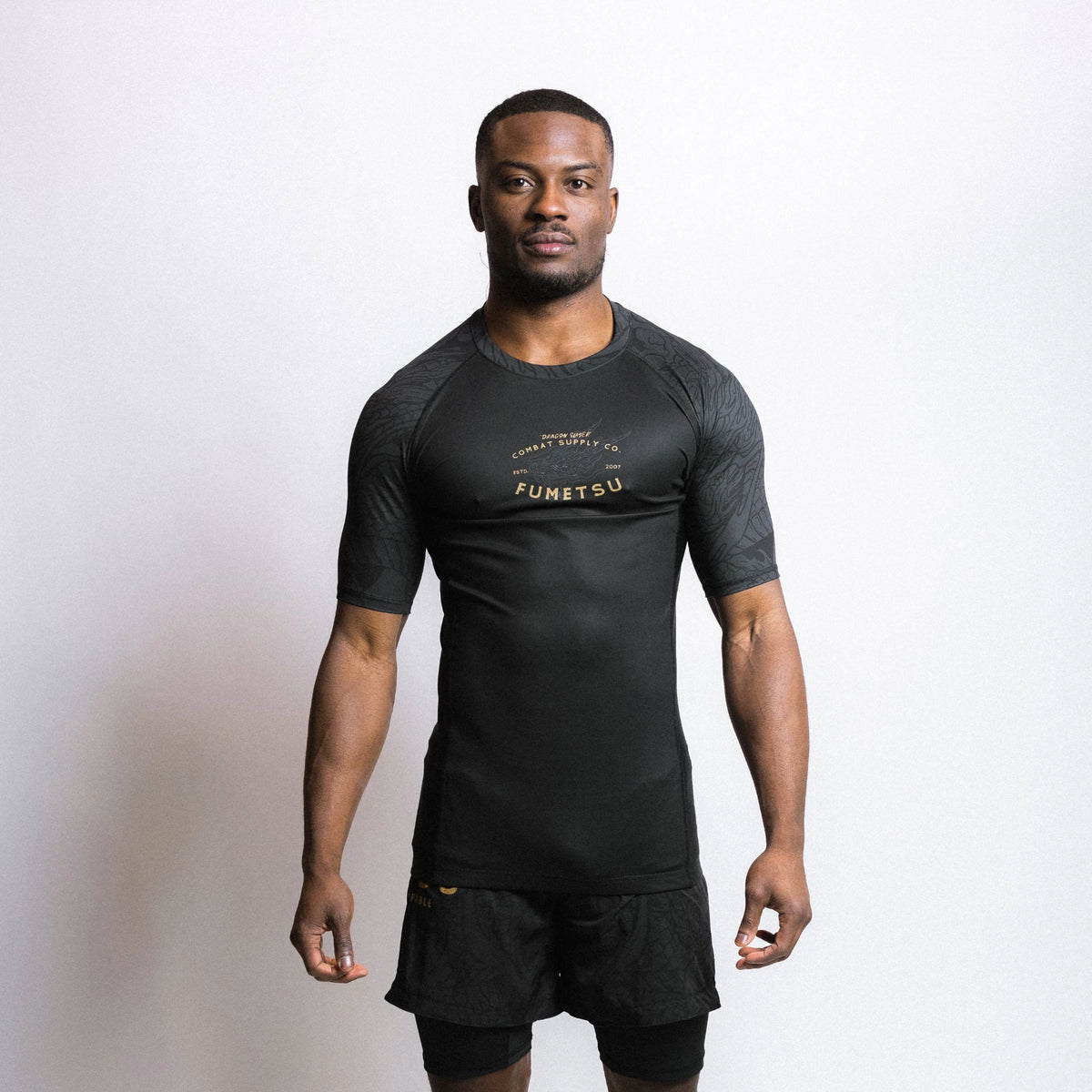 Fumetsu Dragon Slayer Short Sleeve Rash Guard Black/Gold from Made4Fighters